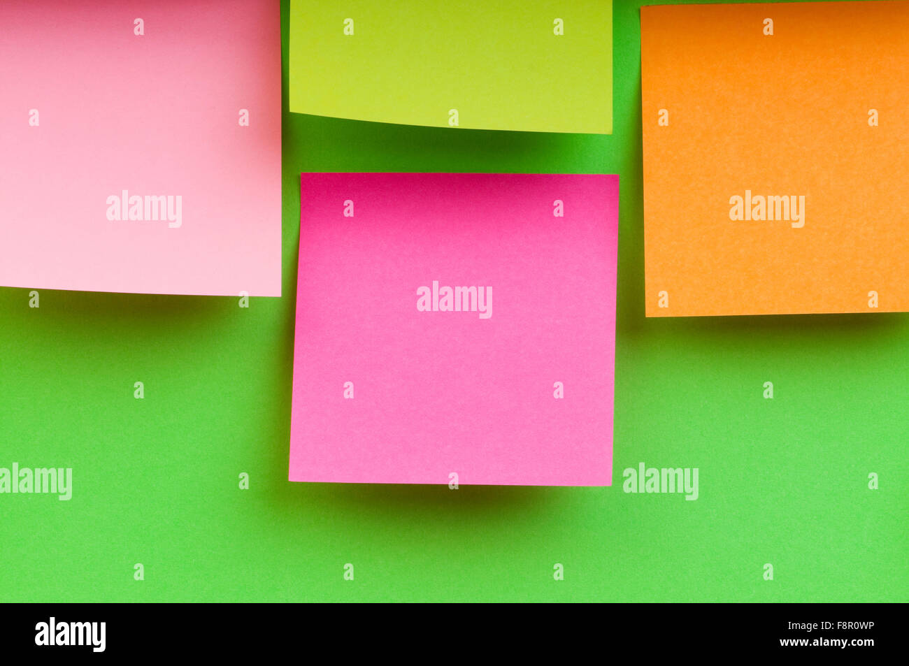 Reminder notes on the bright colorful paper Stock Photo - Alamy