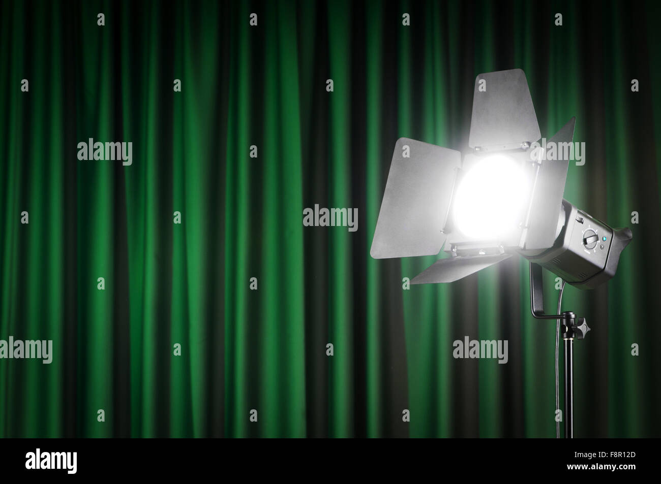 Curtains and projector lights wtih space for your text Stock Photo - Alamy