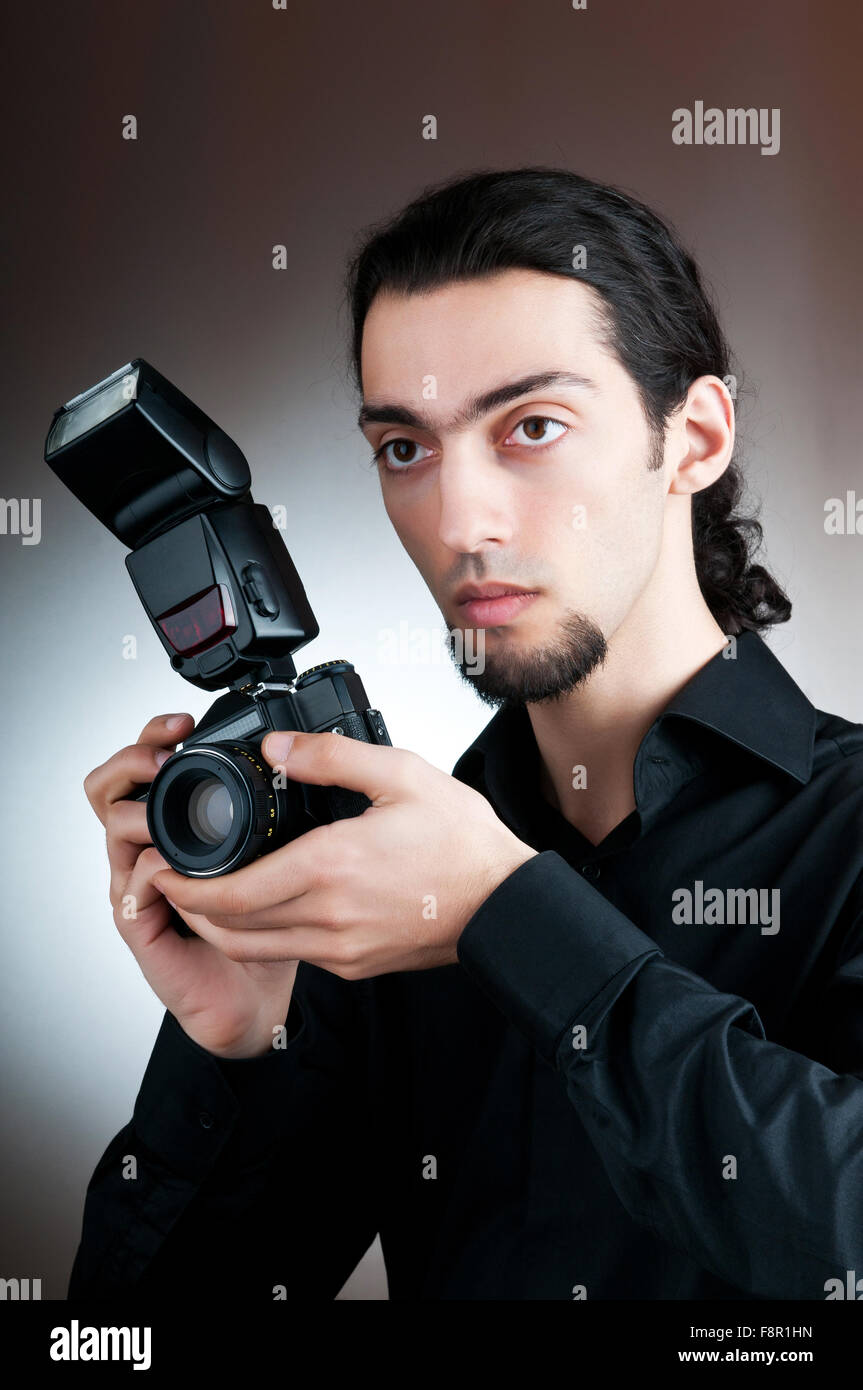 Photographer with the digital camera Stock Photo - Alamy