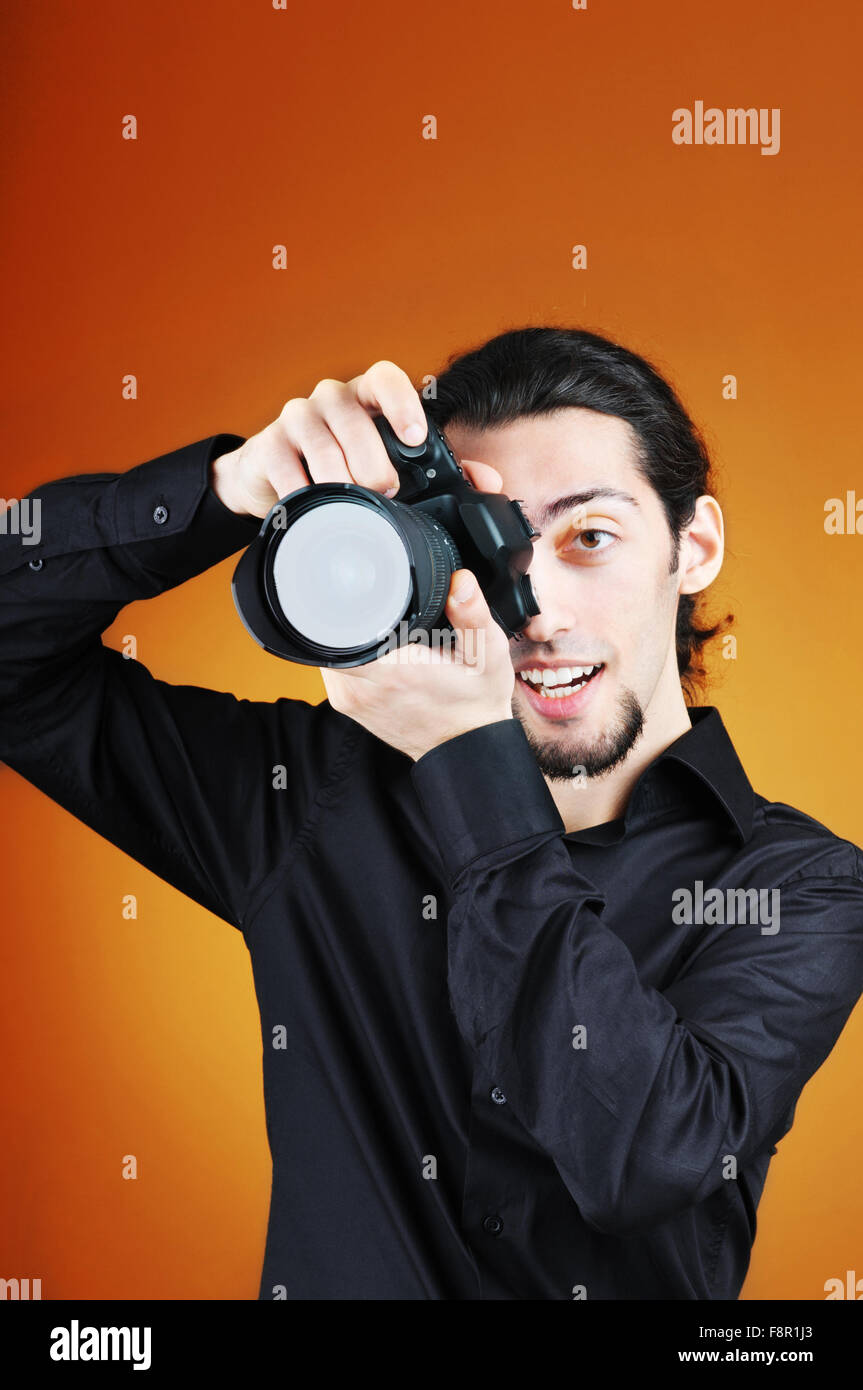 Photographer with the digital camera Stock Photo - Alamy