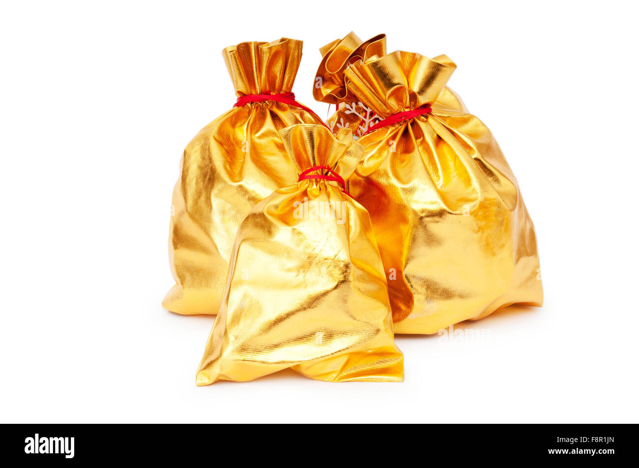 Golden sacks full of something good Stock Photo - Alamy