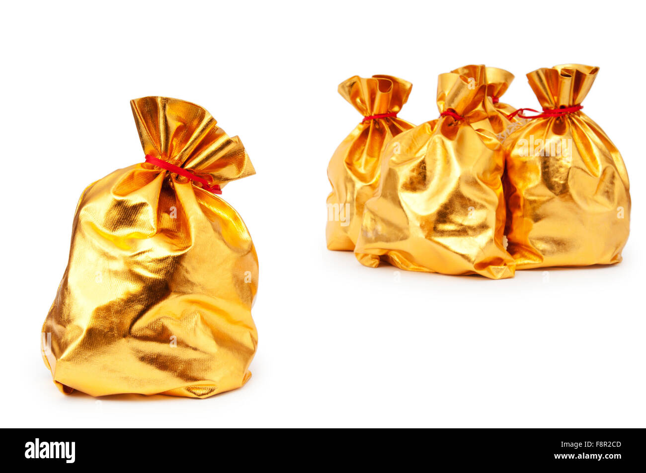 Golden sacks full of something good Stock Photo - Alamy