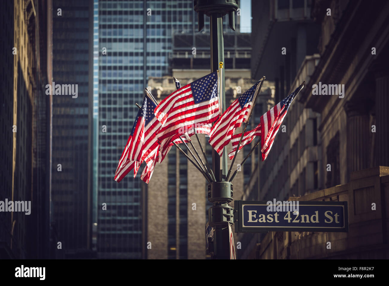 New York City - September 19: Manhattan, American flags on a column ...