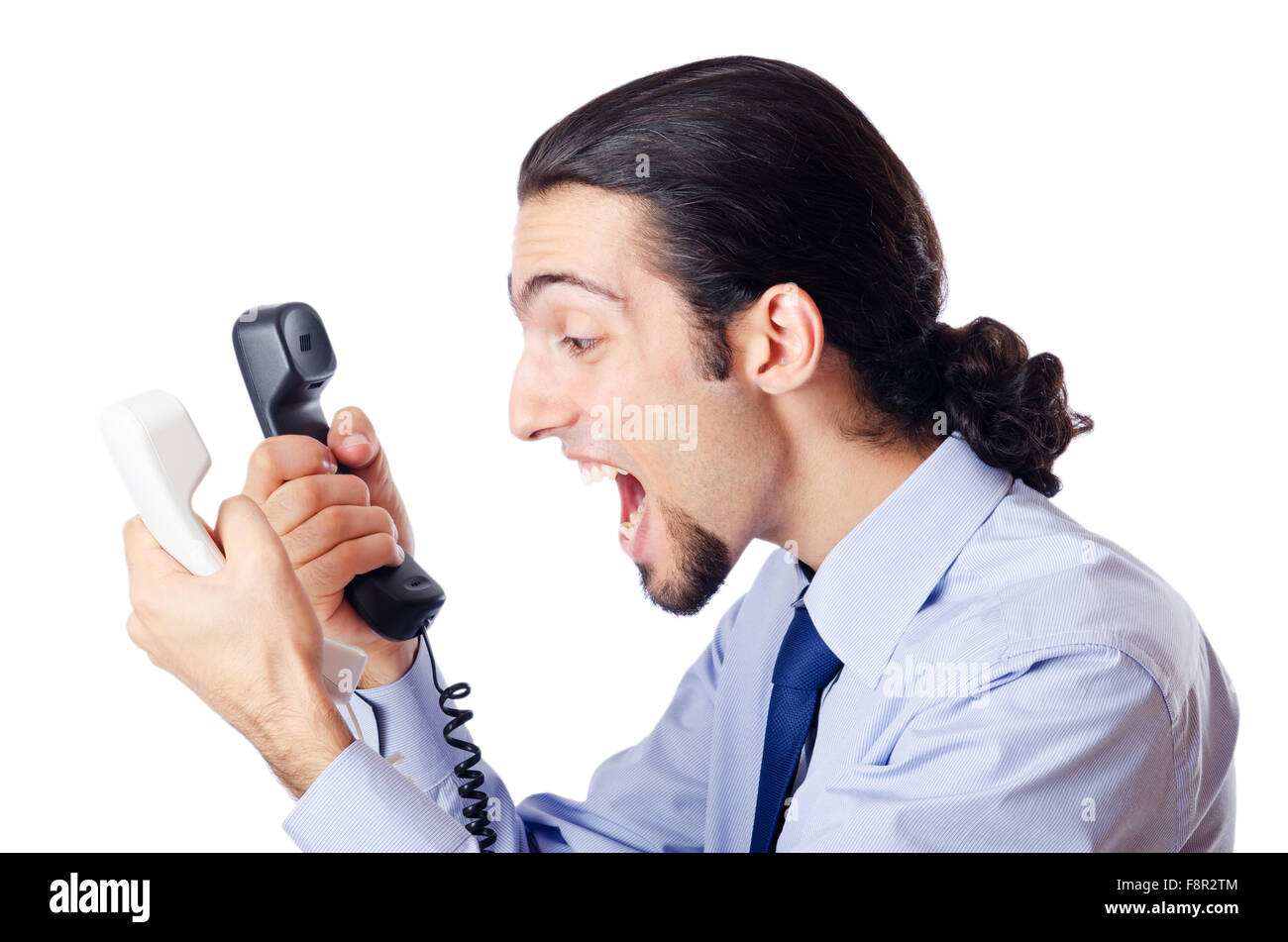 Angry businessman on the phone Stock Photo - Alamy