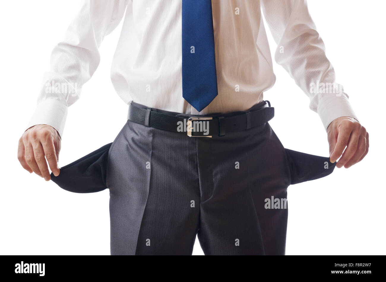 Businessman with empty pockets Stock Photo - Alamy