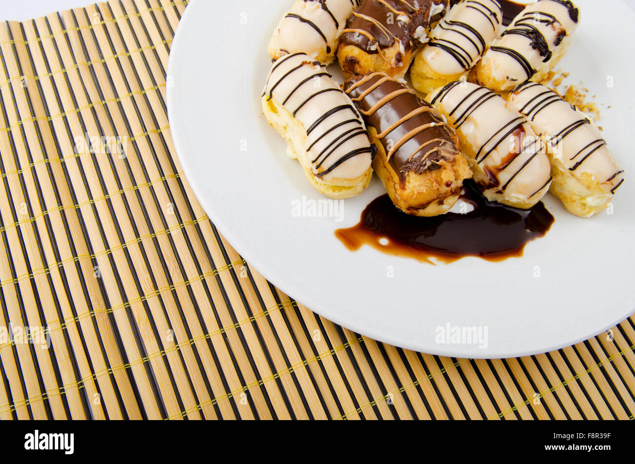 Desserts served in the plate Stock Photo - Alamy