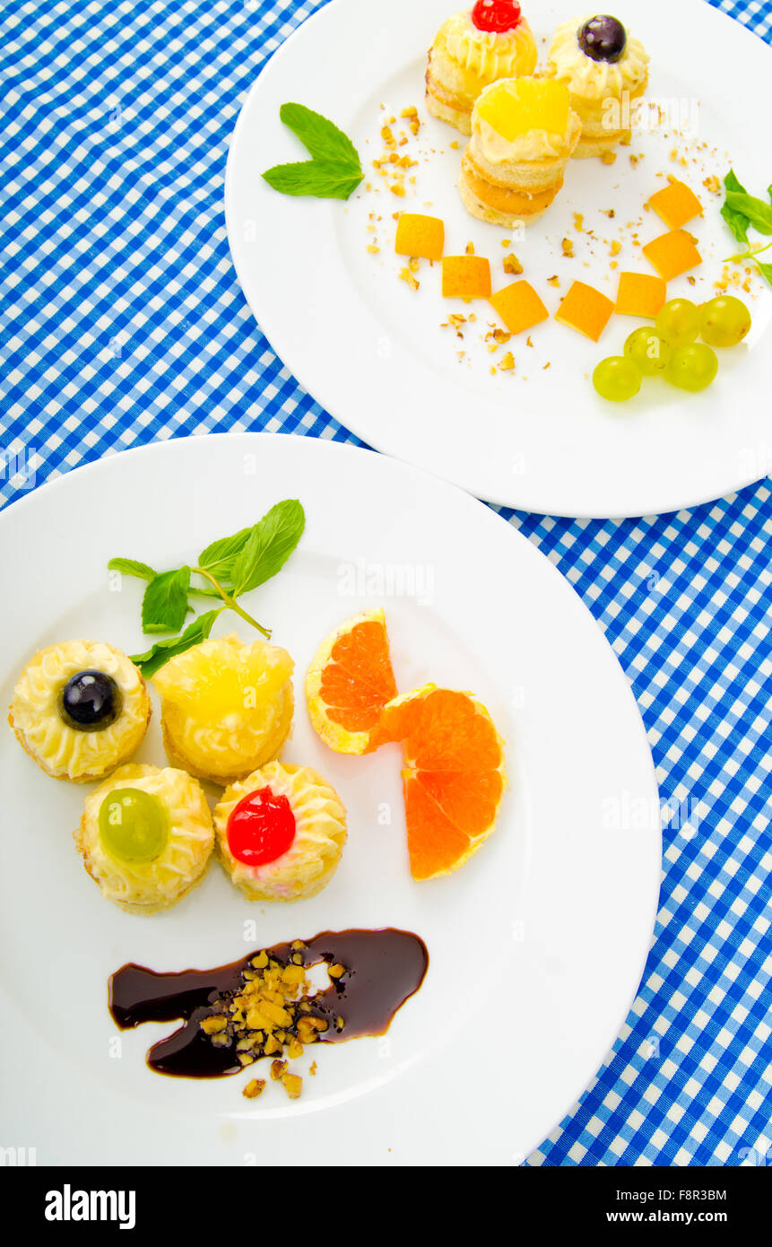 Tasty sweets in the plate Stock Photo - Alamy