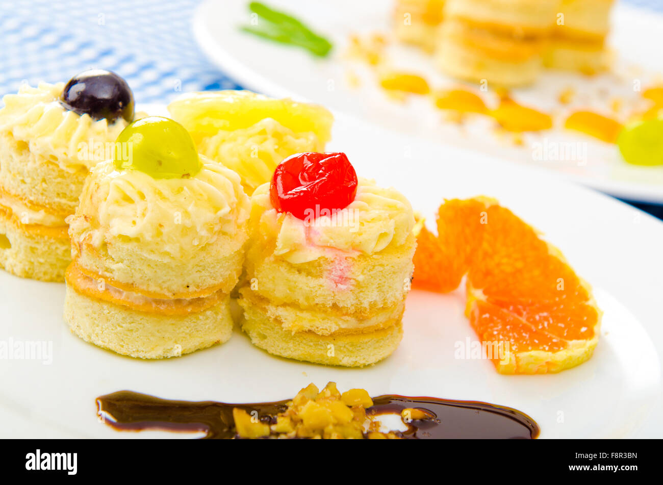 Tasty sweets in the plate Stock Photo - Alamy