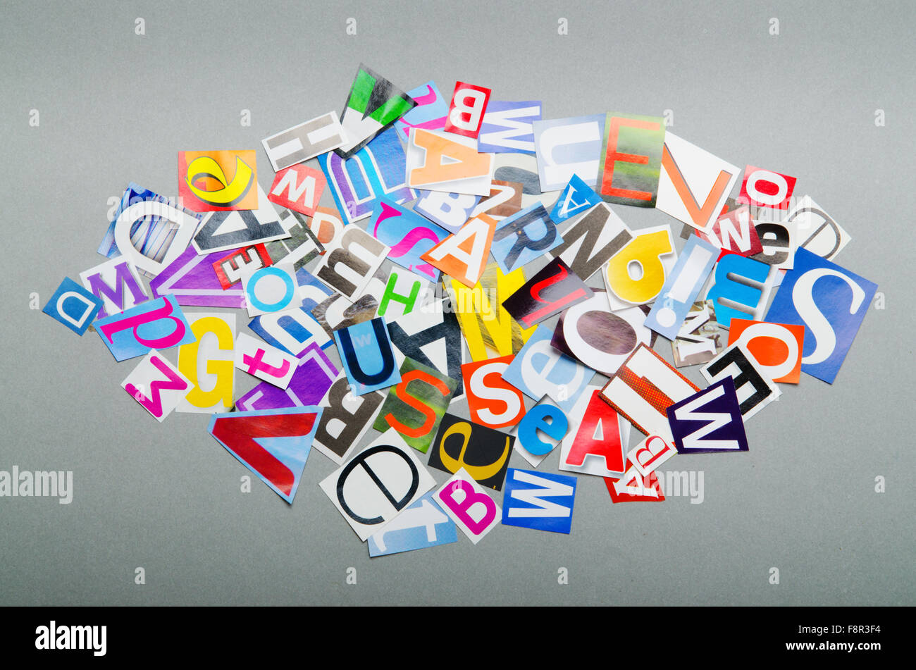 Newspaper clippings with various letters Stock Photo - Alamy
