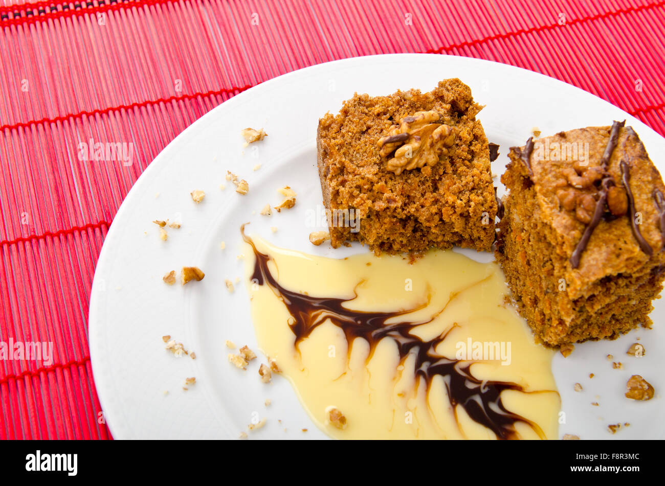 Cake with sweet sauce in plate Stock Photo - Alamy
