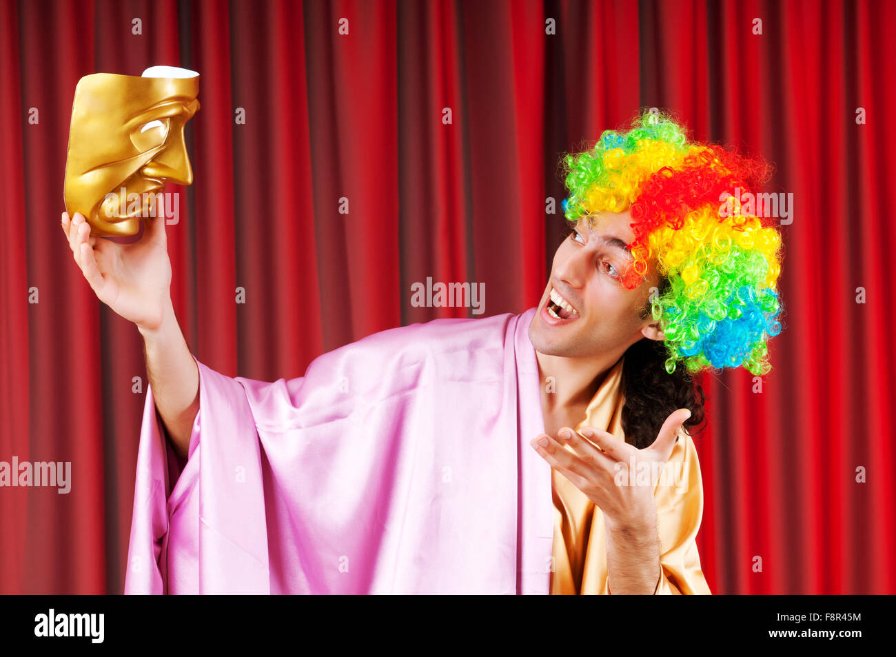 Theater concept with masked actor Stock Photo - Alamy