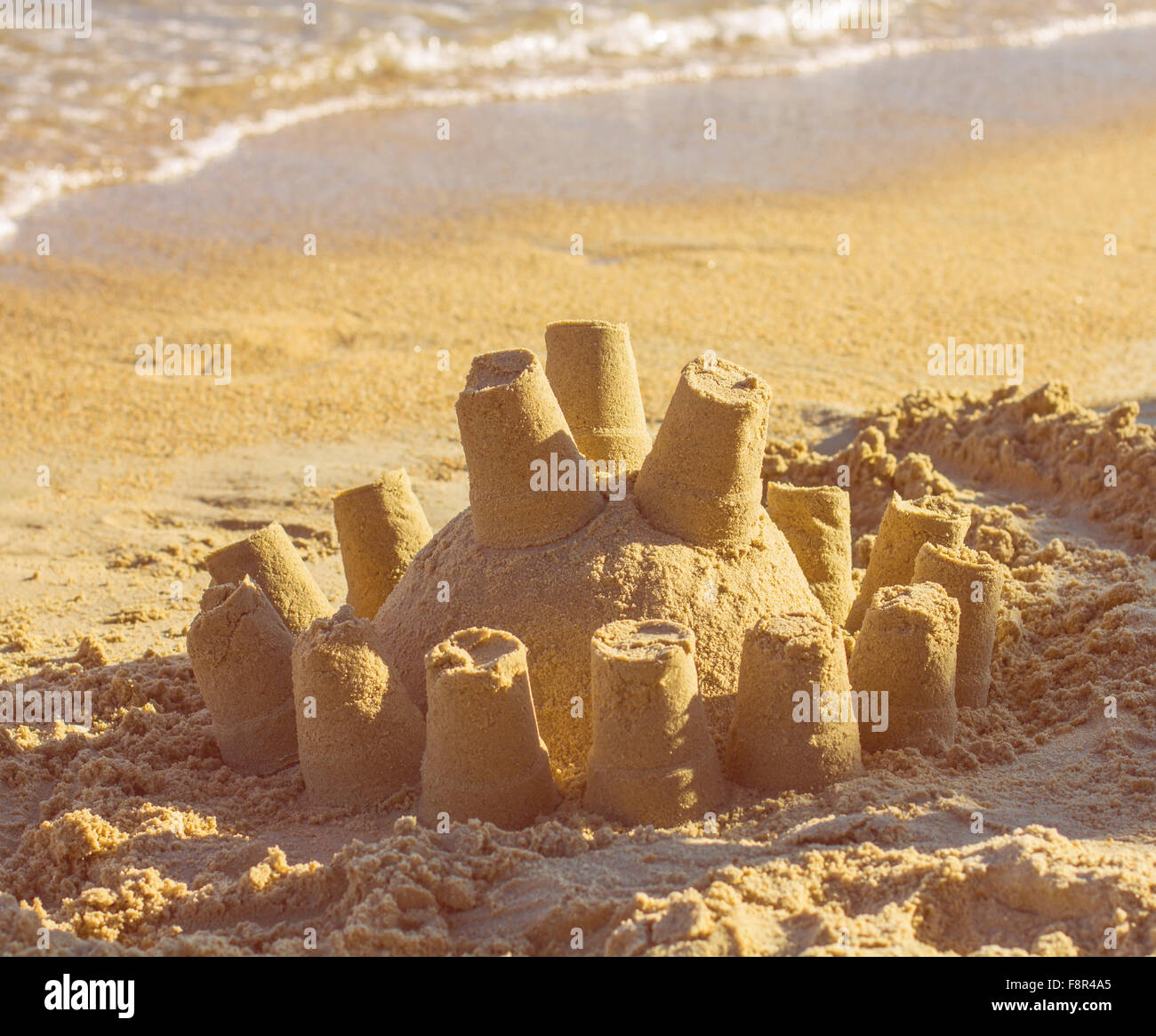Summer Creative Fun Sandcastle on the beach Stock Photo - Alamy