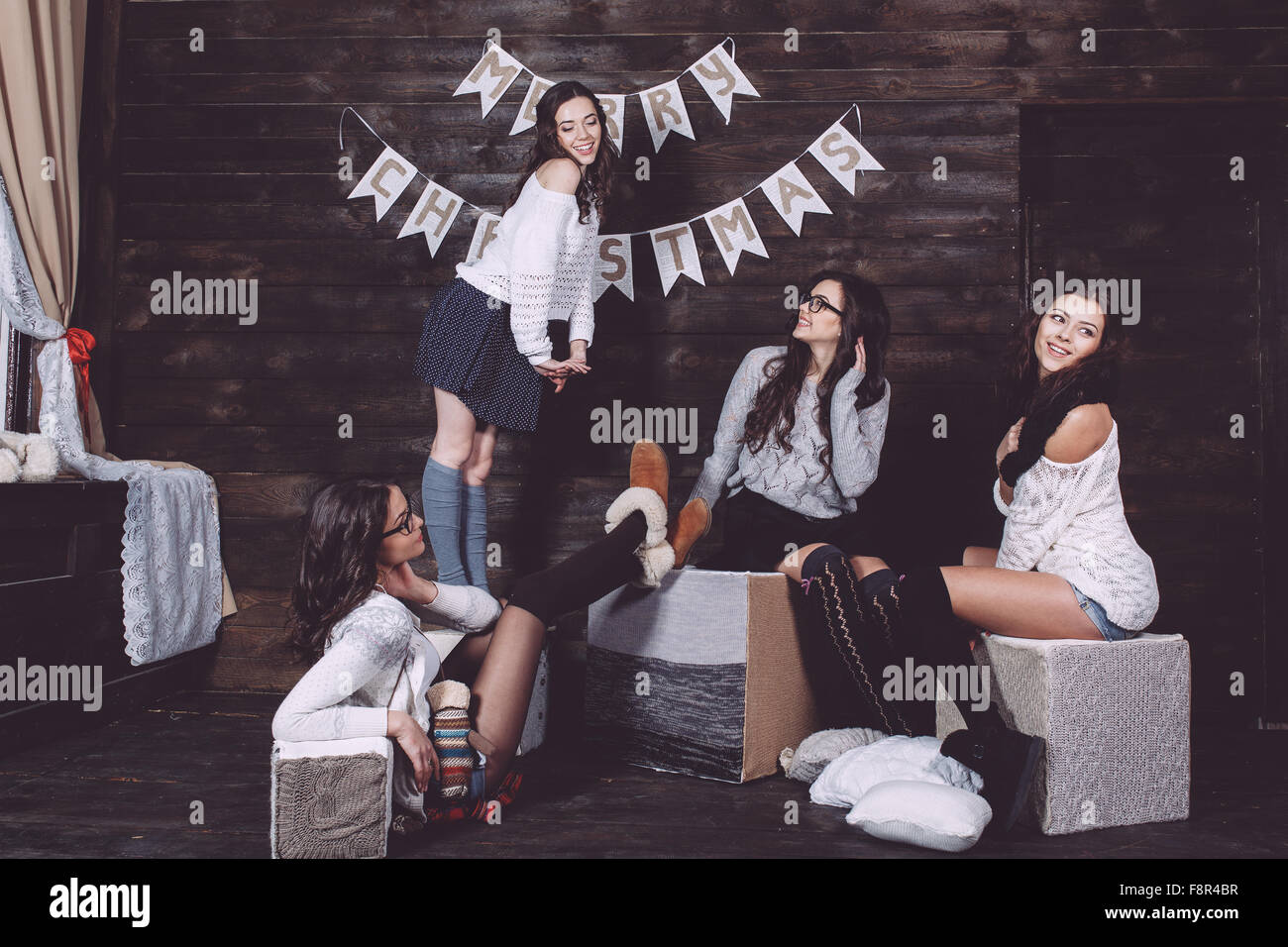 Four charming model posing Stock Photo - Alamy