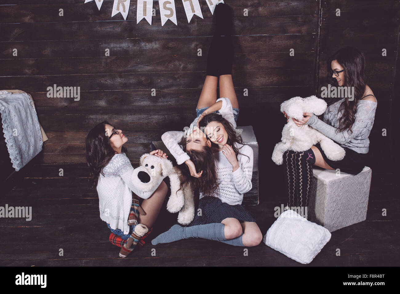 Four charming model posing Stock Photo - Alamy