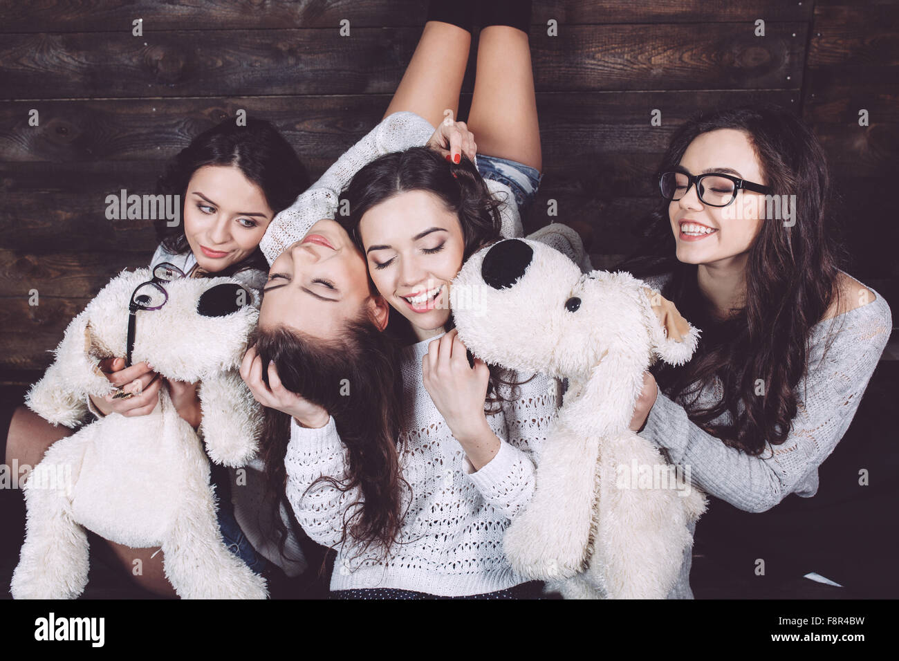 Four charming model posing Stock Photo - Alamy