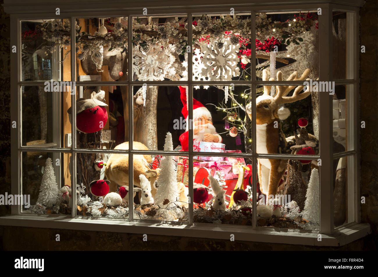 Christmas Santa model in a shop window with a 'santa not for sale' sign ...