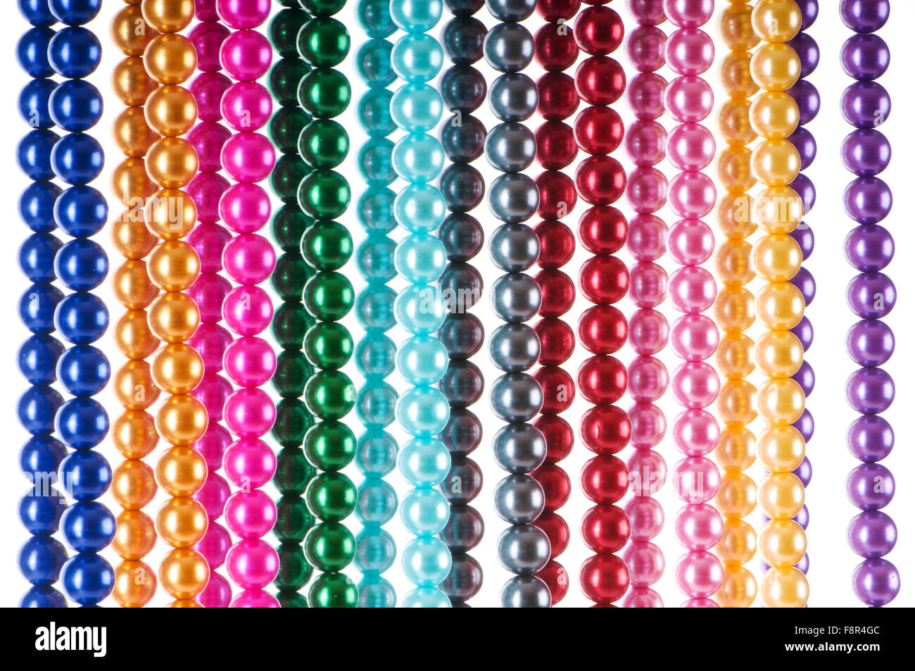 Abstract with colourful pearl necklaces Stock Photo - Alamy