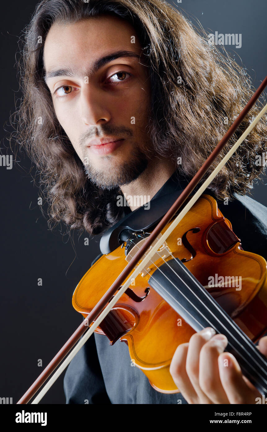 Violin player playing the intstrument Stock Photo - Alamy