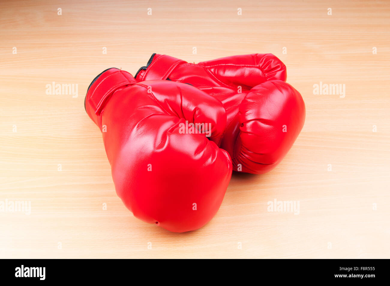 Boxing gloves on the table Stock Photo - Alamy