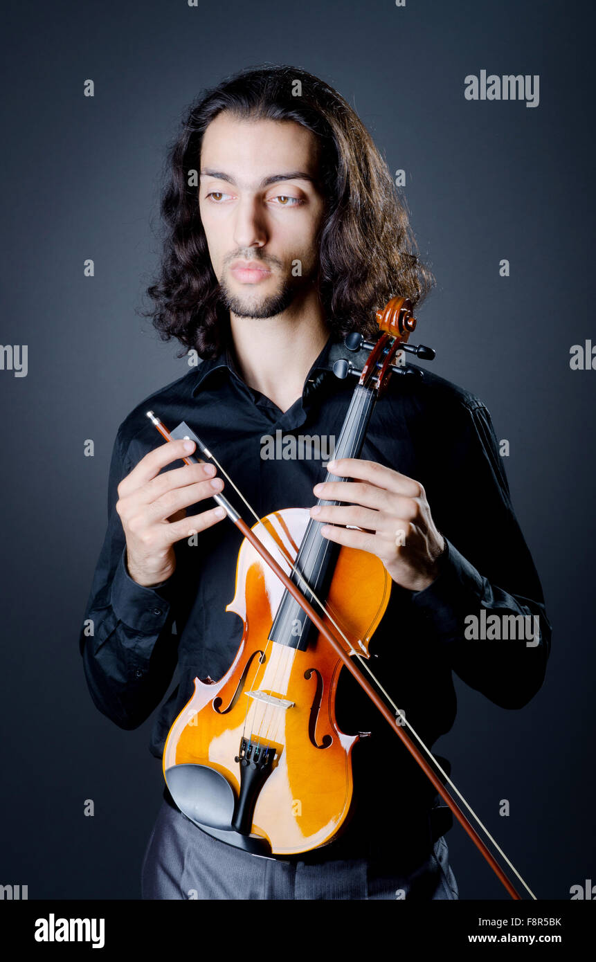 Violin player playing the intstrument Stock Photo - Alamy