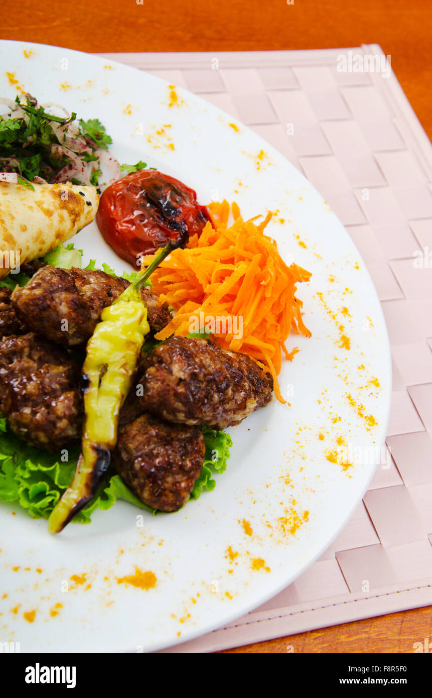 Meat cuisine - kebab served in plate Stock Photo - Alamy