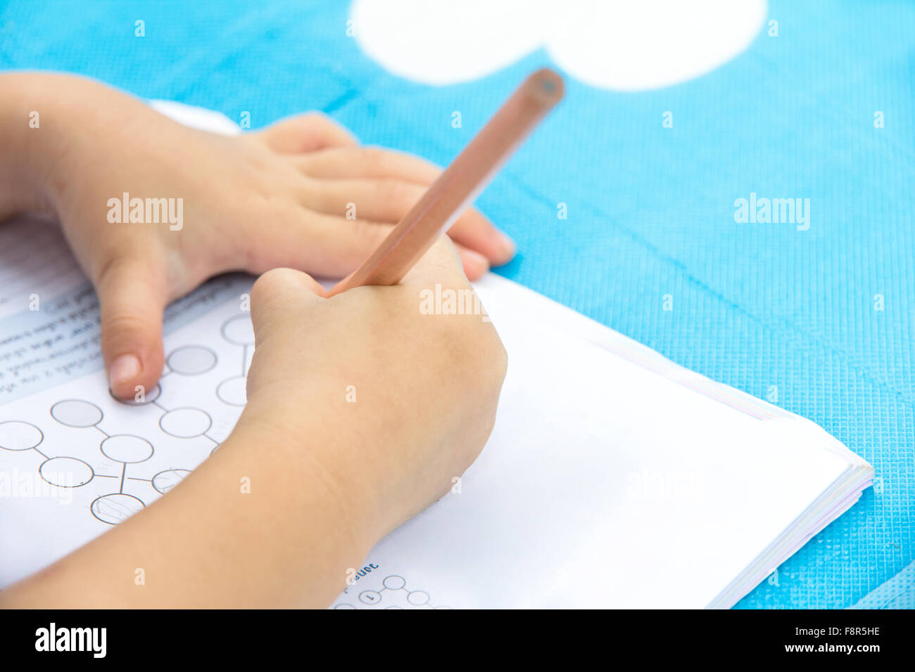 Little girl doing homework Stock Photo - Alamy