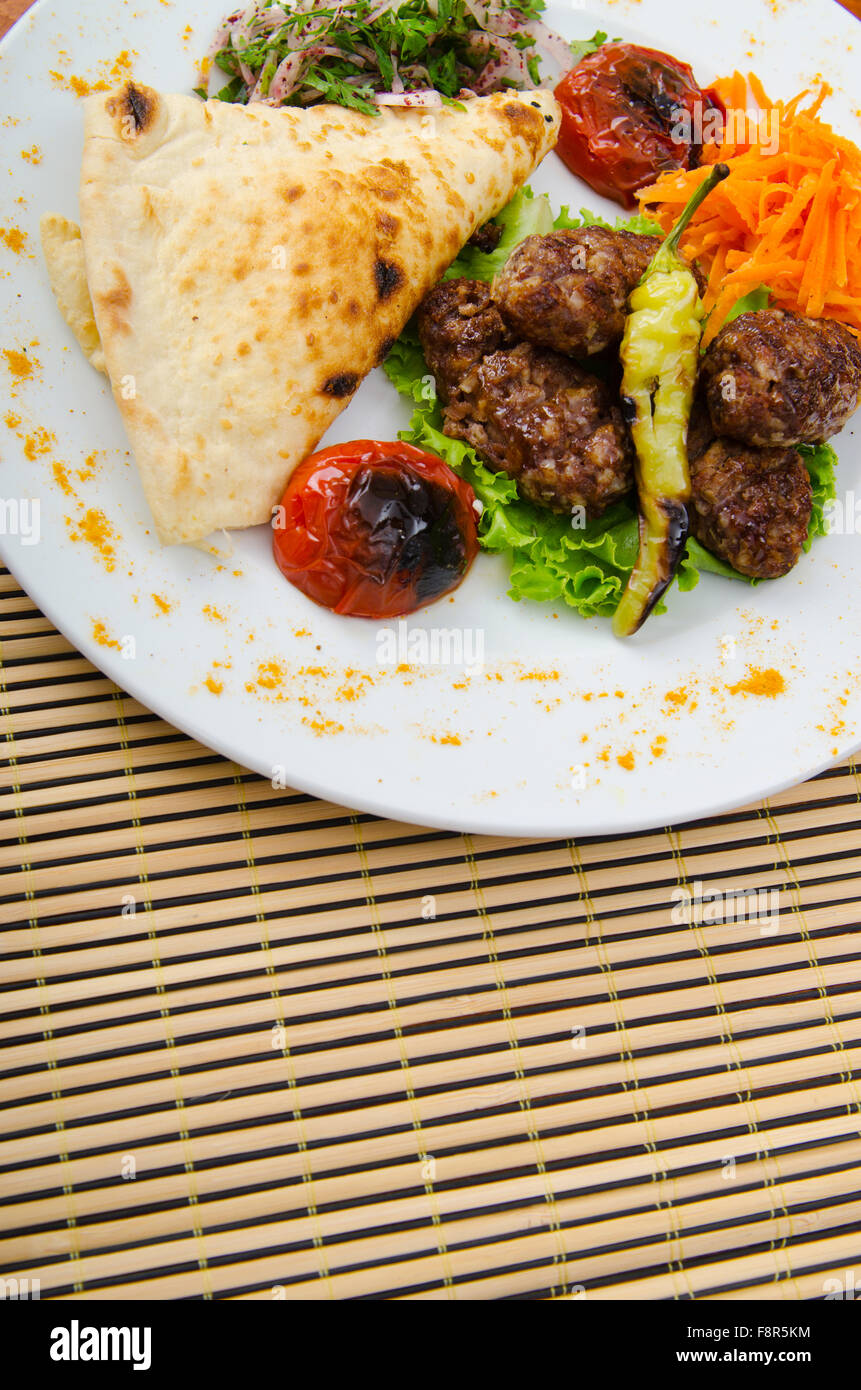 Meat cuisine - kebab served in plate Stock Photo - Alamy