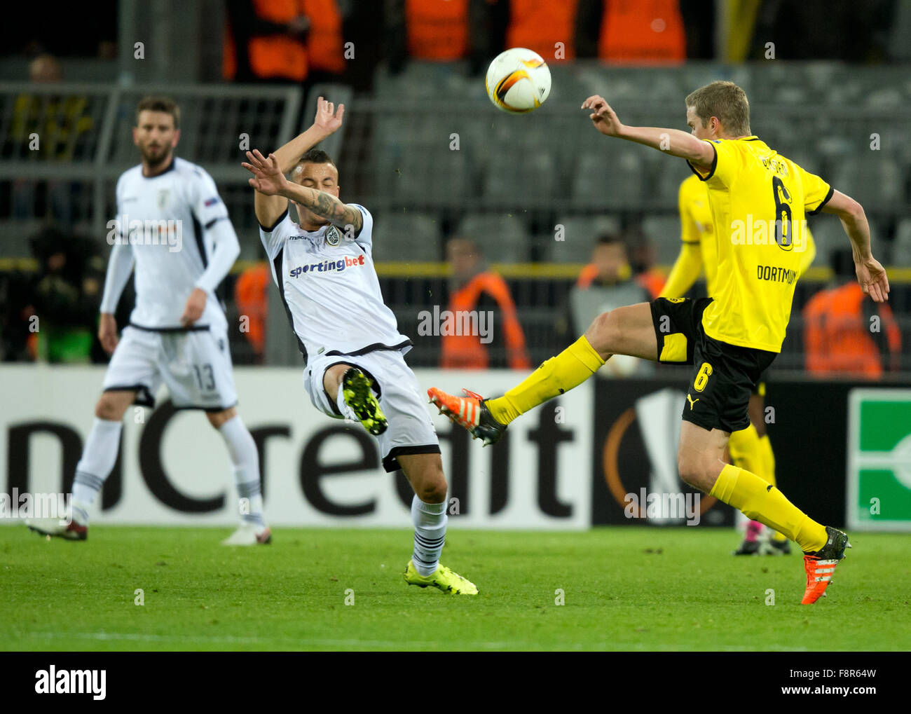 Dortmund, Germany. 10th Dec, 2015. Dortmund's Sven Bender (R) and ...