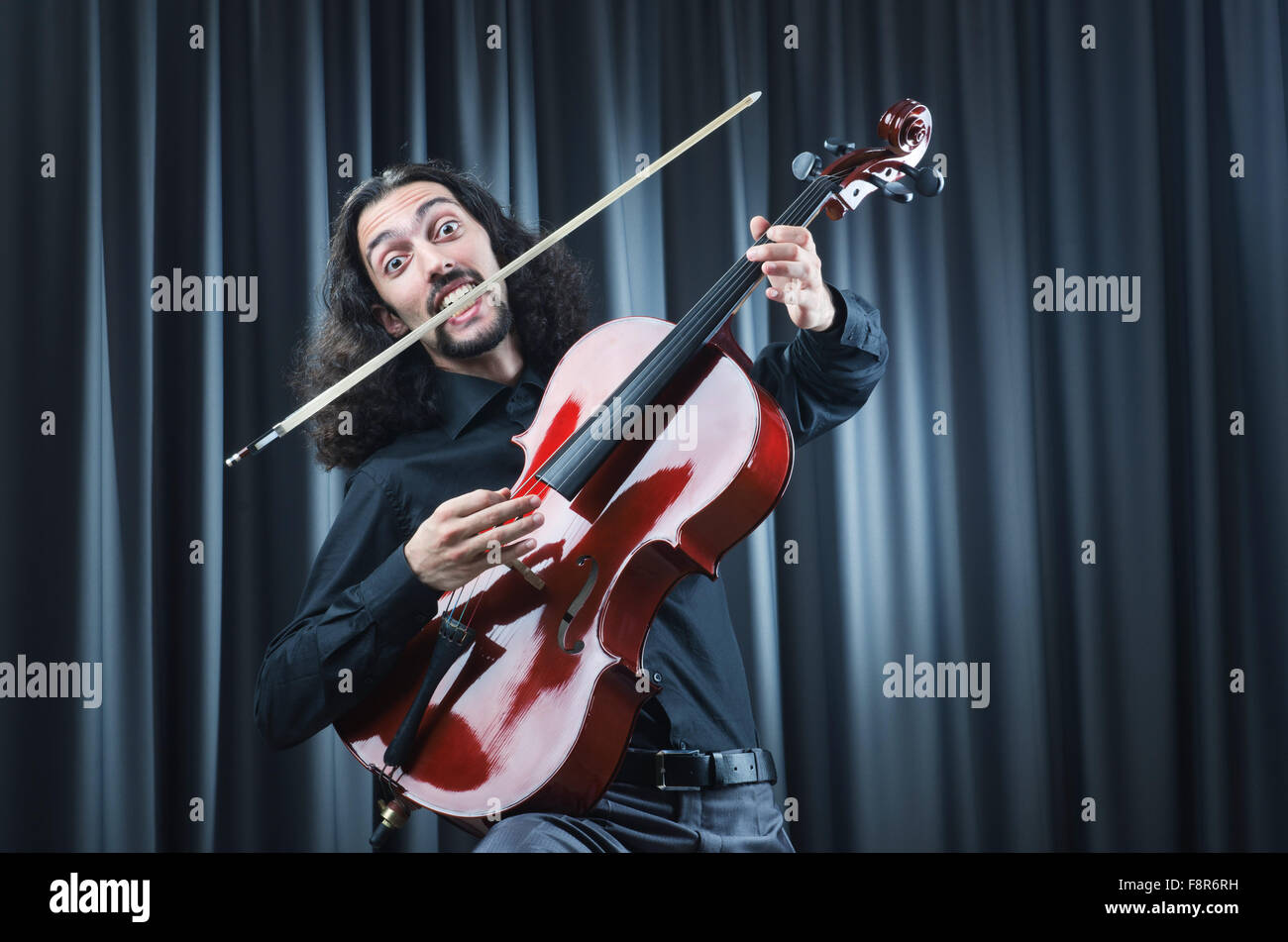 Man playing the cello Stock Photo - Alamy