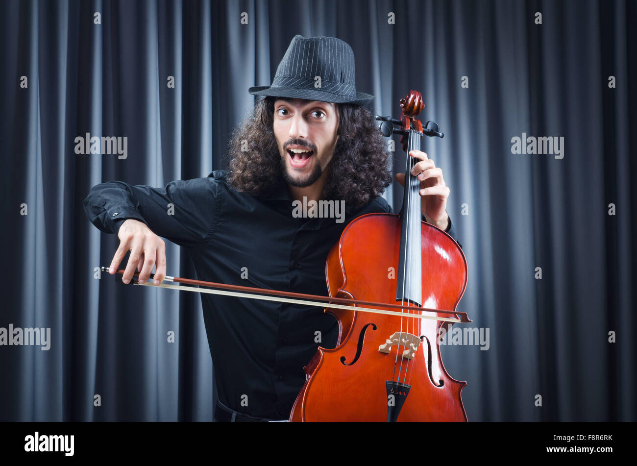 Man playing the cello Stock Photo - Alamy