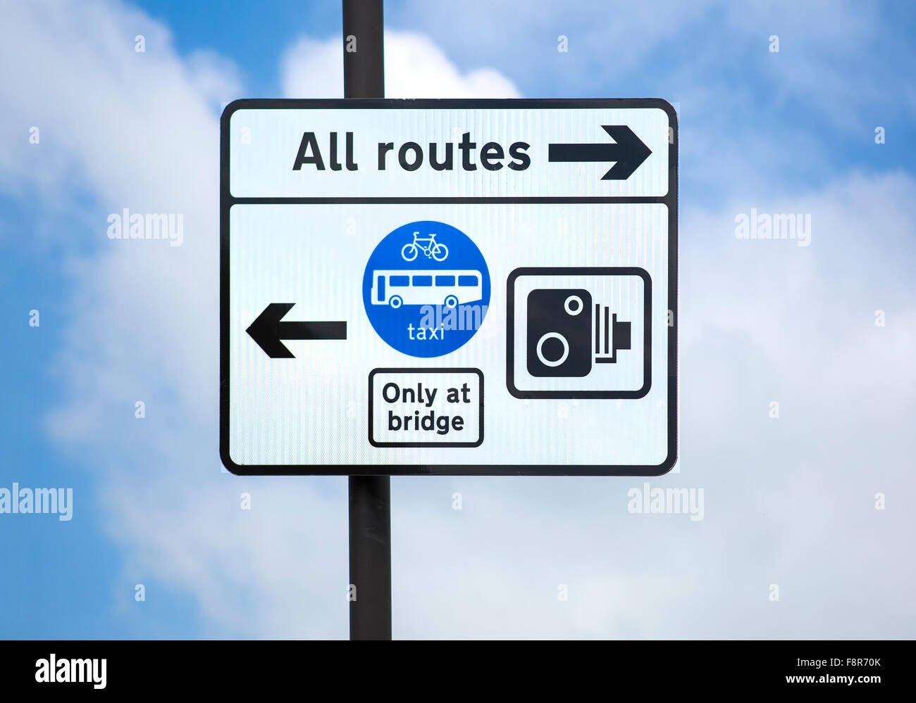 Road Sign Against Sky Showing All Routes and restrictions Stock Photo ...