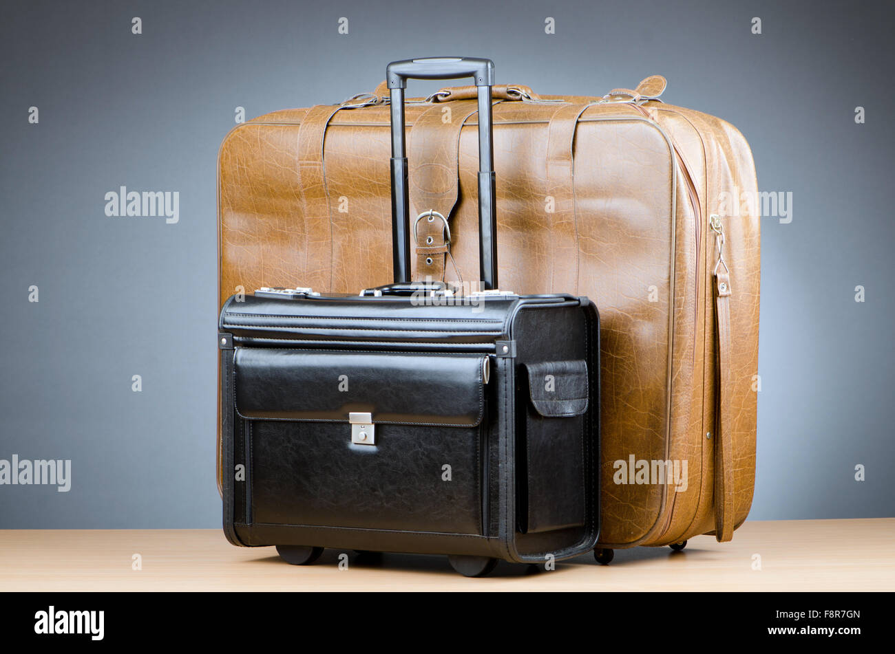Luggage concept with big case Stock Photo - Alamy