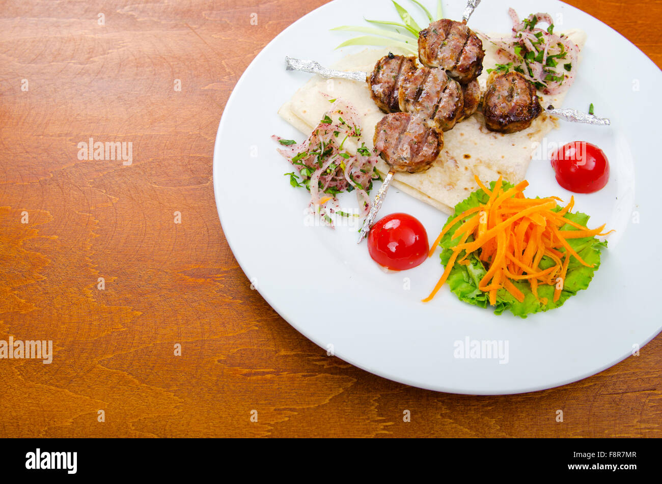 Meat cuisine - kebab served in plate Stock Photo - Alamy