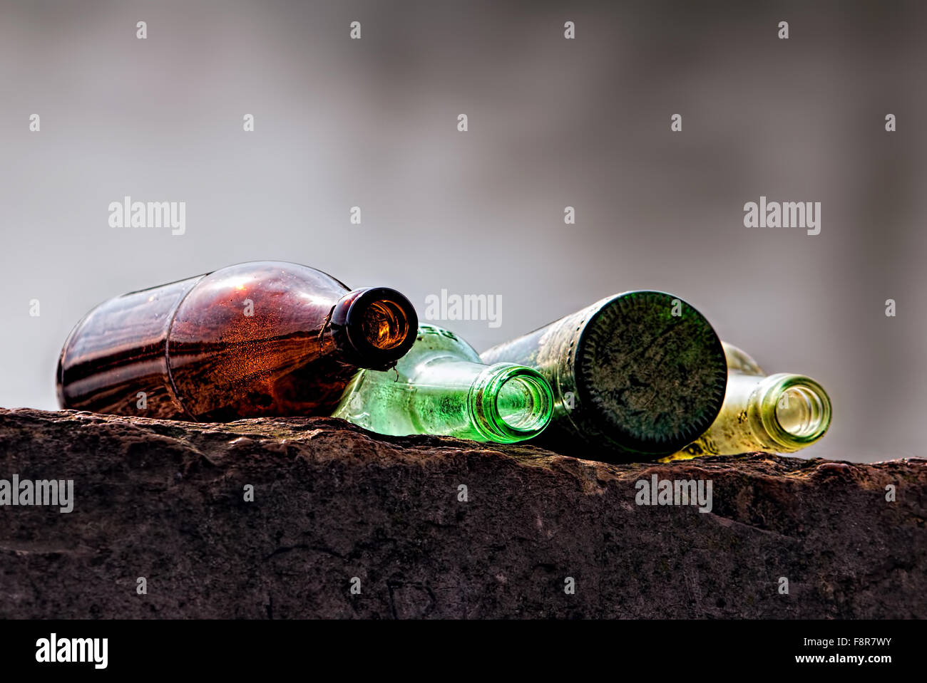 Colorful bottles in a row Stock Photo - Alamy