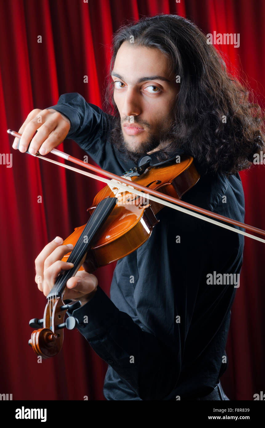 Violin player playing the intstrument Stock Photo - Alamy