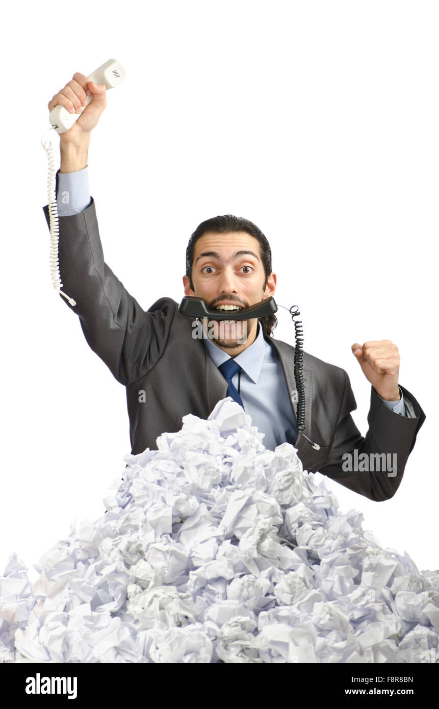 Man with lots of crumpled paper Stock Photo - Alamy