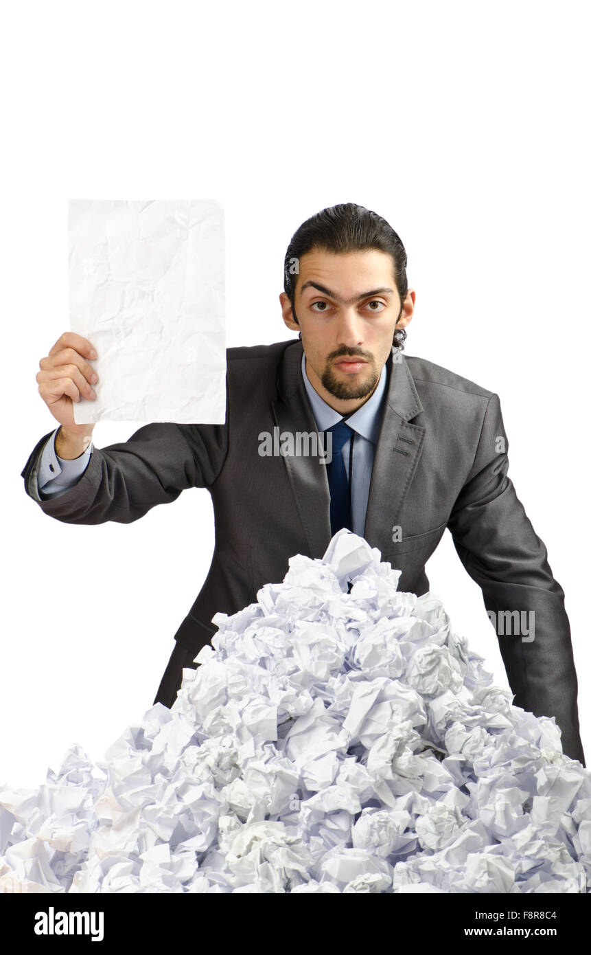 Man with lots of crumpled paper Stock Photo - Alamy