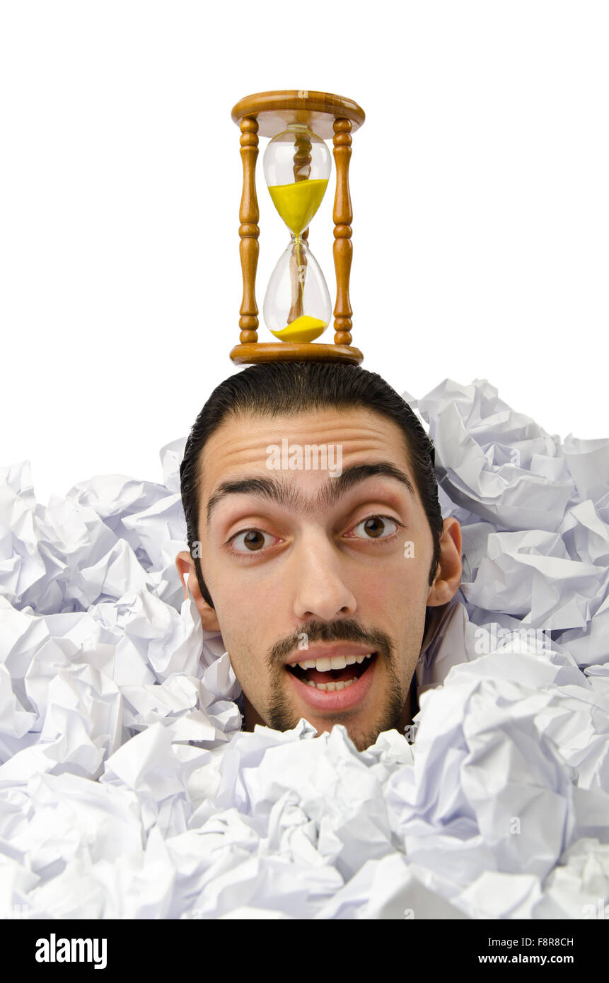 Man with lots of crumpled paper Stock Photo - Alamy