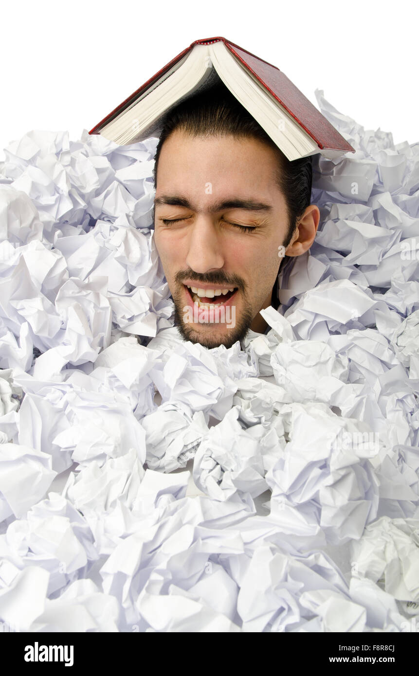 Man with lots of crumpled paper Stock Photo - Alamy