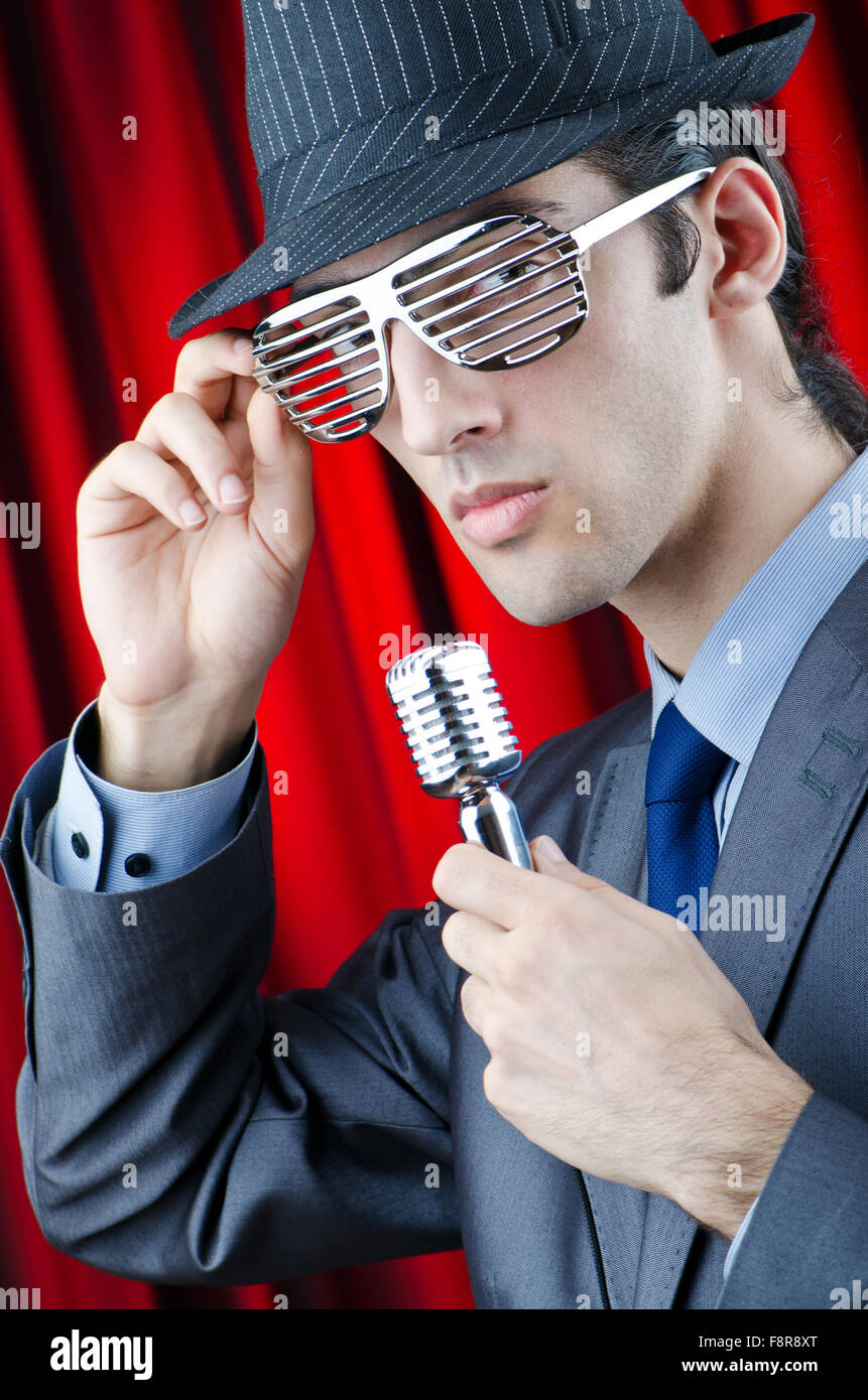 Man performing at the concert Stock Photo - Alamy