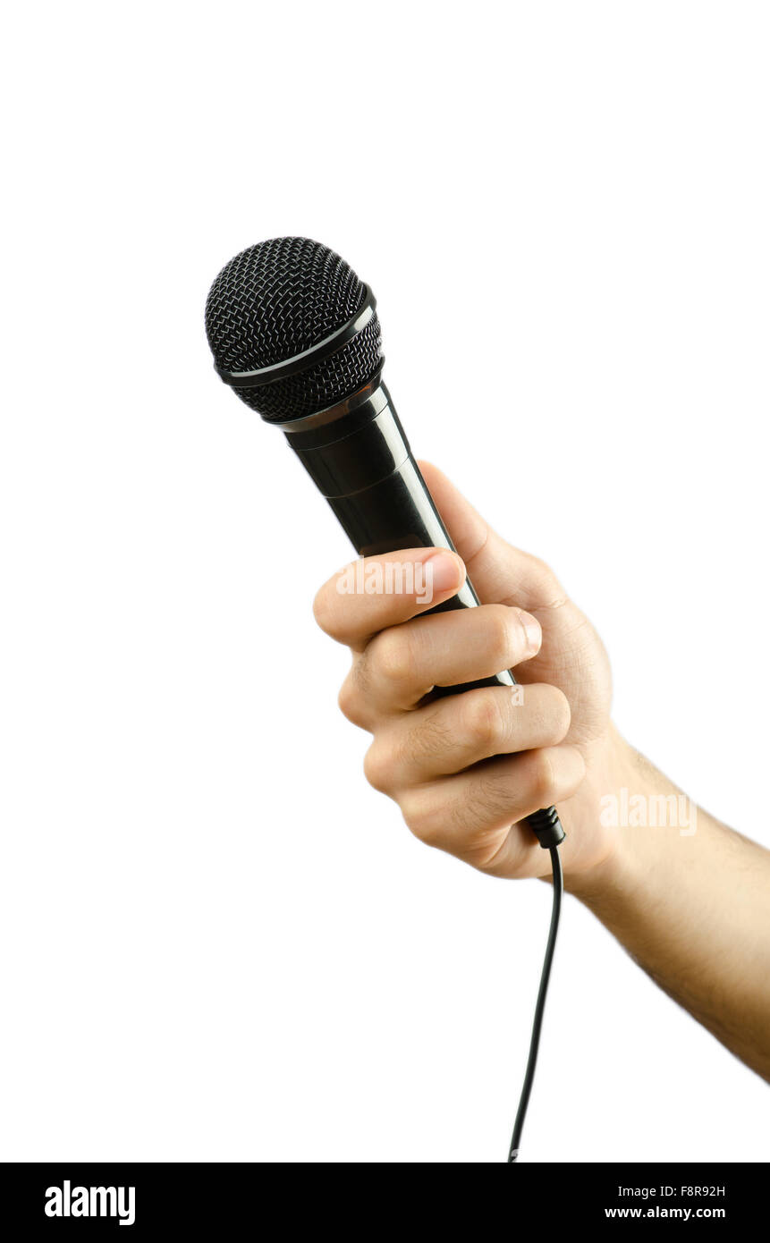 Hand holding microphone on white Stock Photo - Alamy