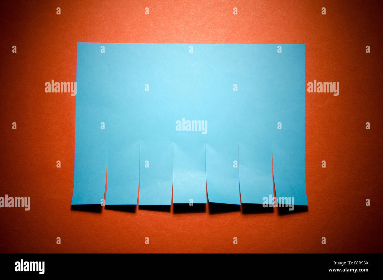 Tear off paper notice on the wall Stock Photo - Alamy