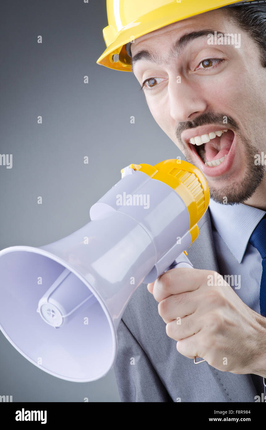 Man shouting and yelling with loudspeaker Stock Photo - Alamy