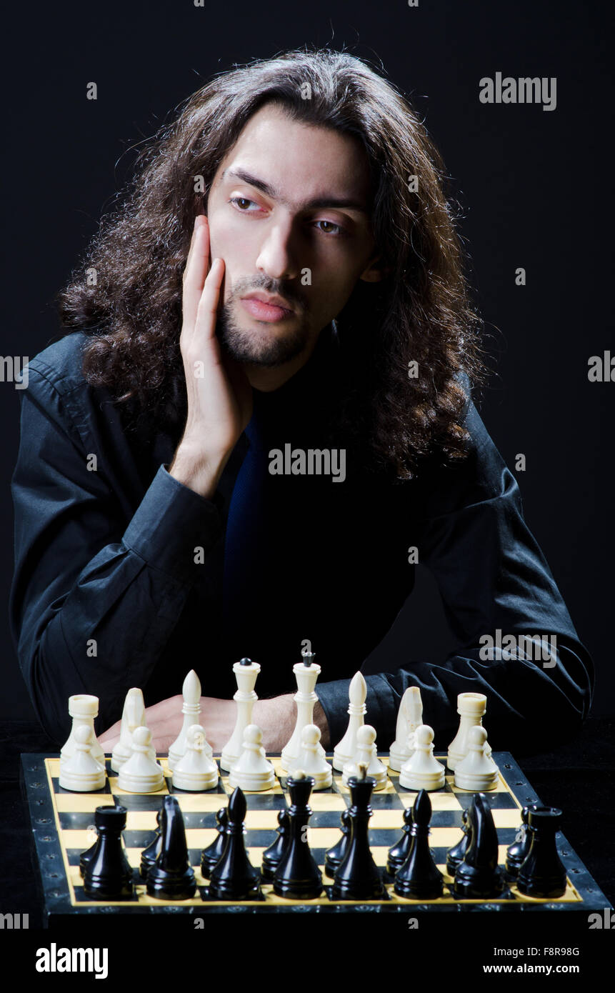 Chess player playing his game Stock Photo - Alamy
