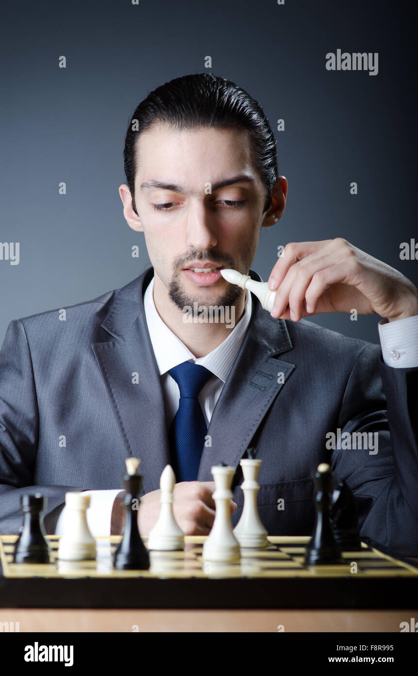 Chess player playing his game Stock Photo - Alamy