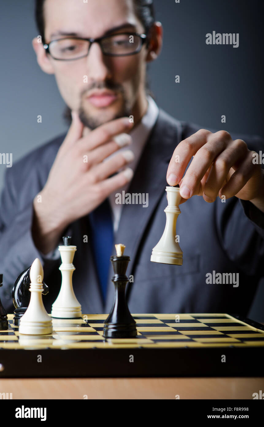 Chess player playing his game Stock Photo - Alamy