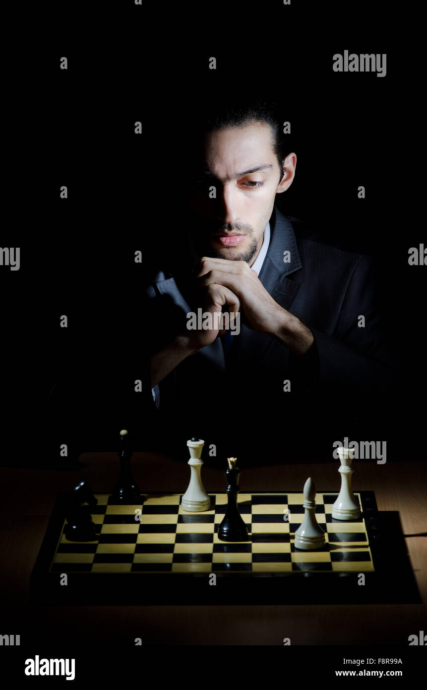 Chess player playing his game Stock Photo - Alamy
