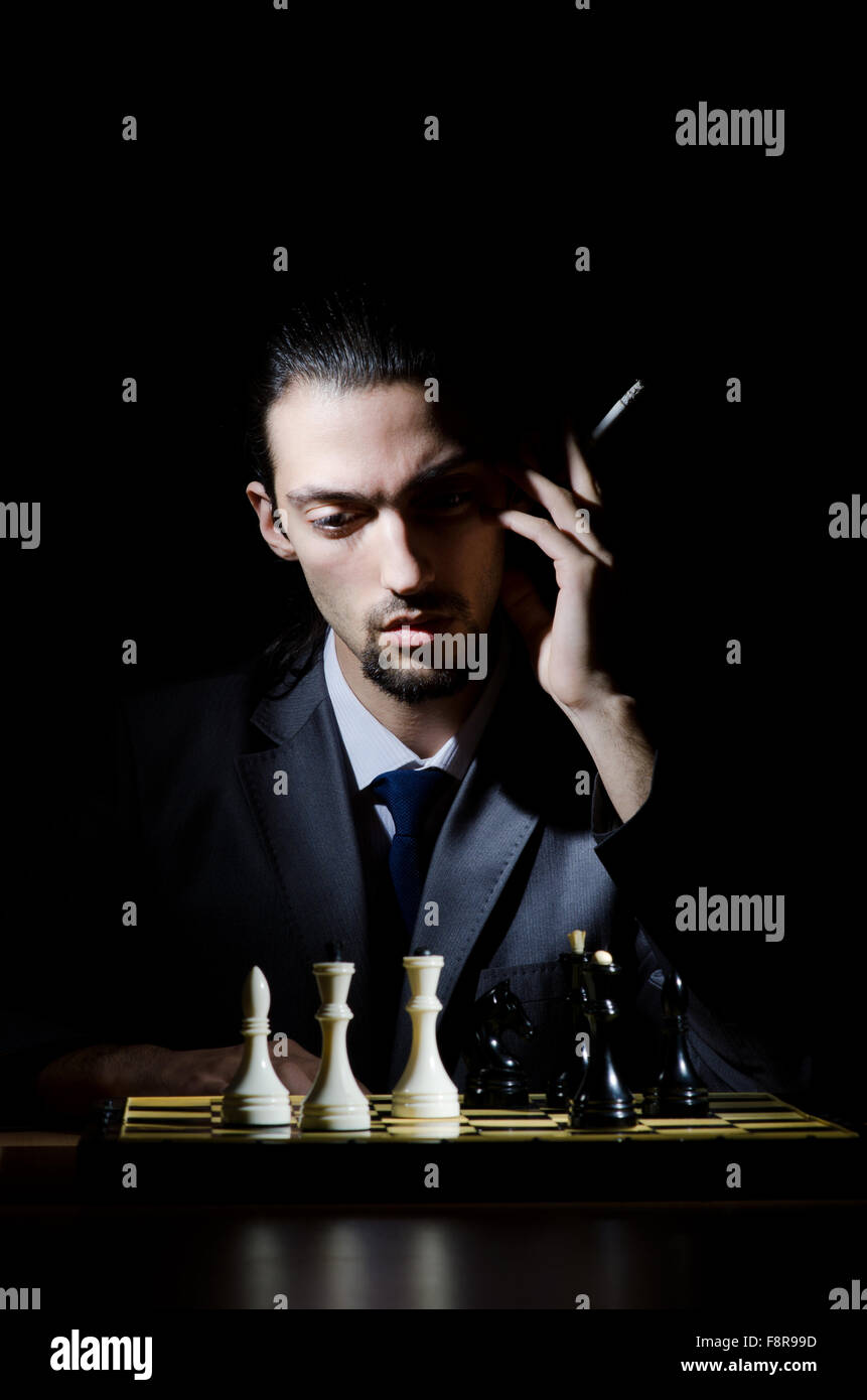 Chess player playing his game Stock Photo - Alamy