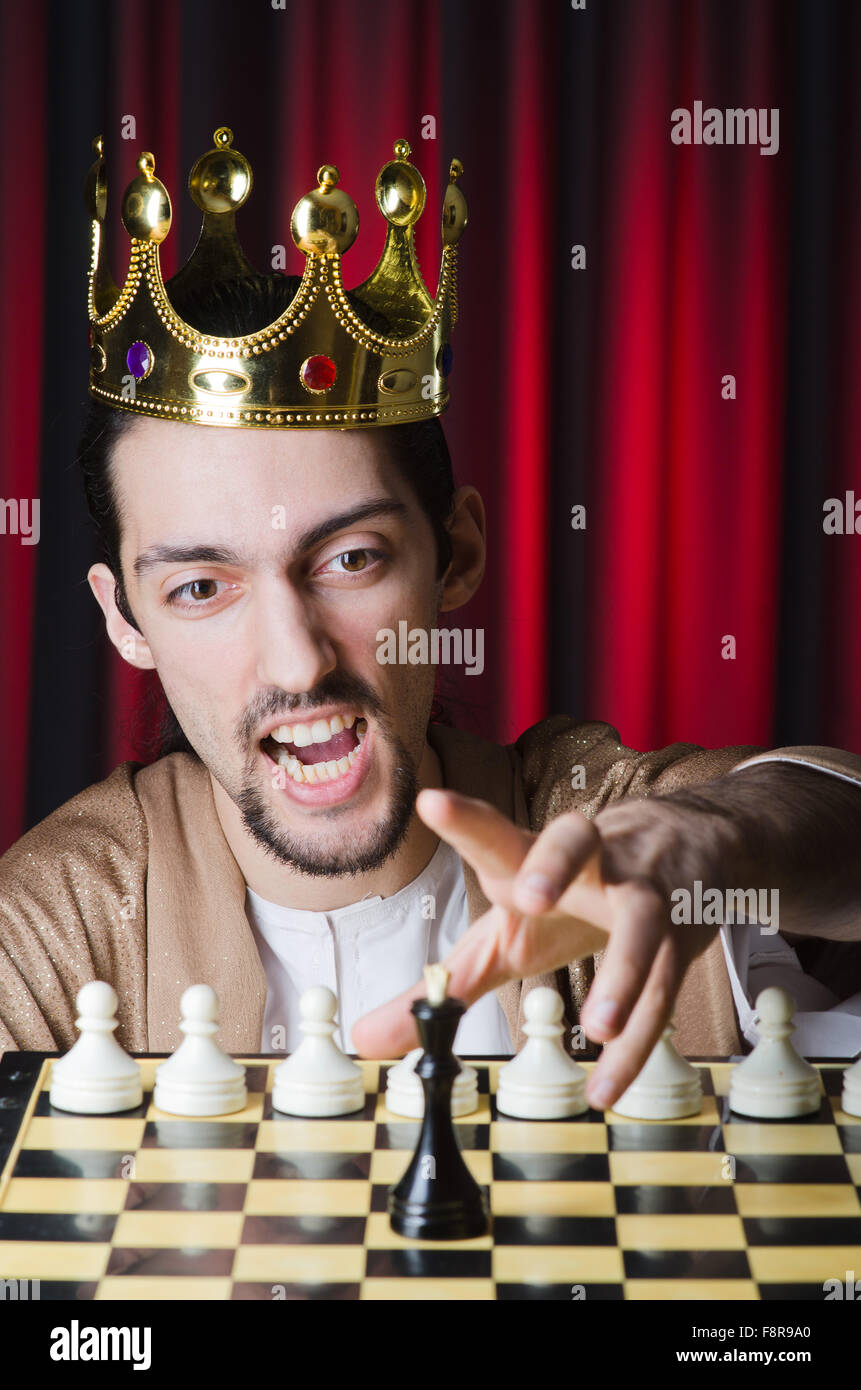 Chess player playing his game Stock Photo - Alamy