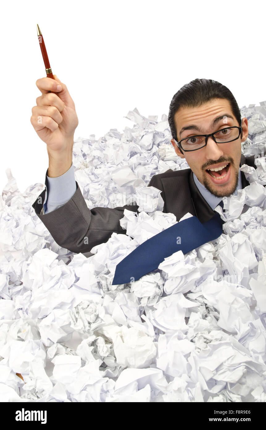 Man with lots of waste paper Stock Photo - Alamy